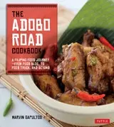 A capa do livro de receitas Adobo Road com uma foto de asas de frango cozidas em uma tigela.