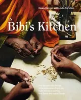 Am Bibi's Kitchen Kachbuch Cover mat Foto vun Hänn déi Somen virbereeden.