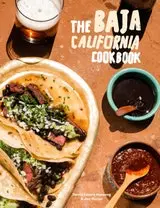 Cover ng cookbook na nagtatampok ng mga steak tacos, salsa sa magkahiwalay na lalagyan, at isang baso ng beer.