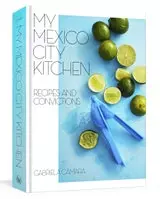 غلاف كتاب الطبخ يضم الليمون الحامض وعصارة الحمضيات على خلفية زرقاء مخضر.
