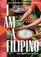 I Am a Filipinoクックブックの表紙には、バナナの葉で覆われた宴会テーブルと伝統的な料理や食材のボウルがあります。