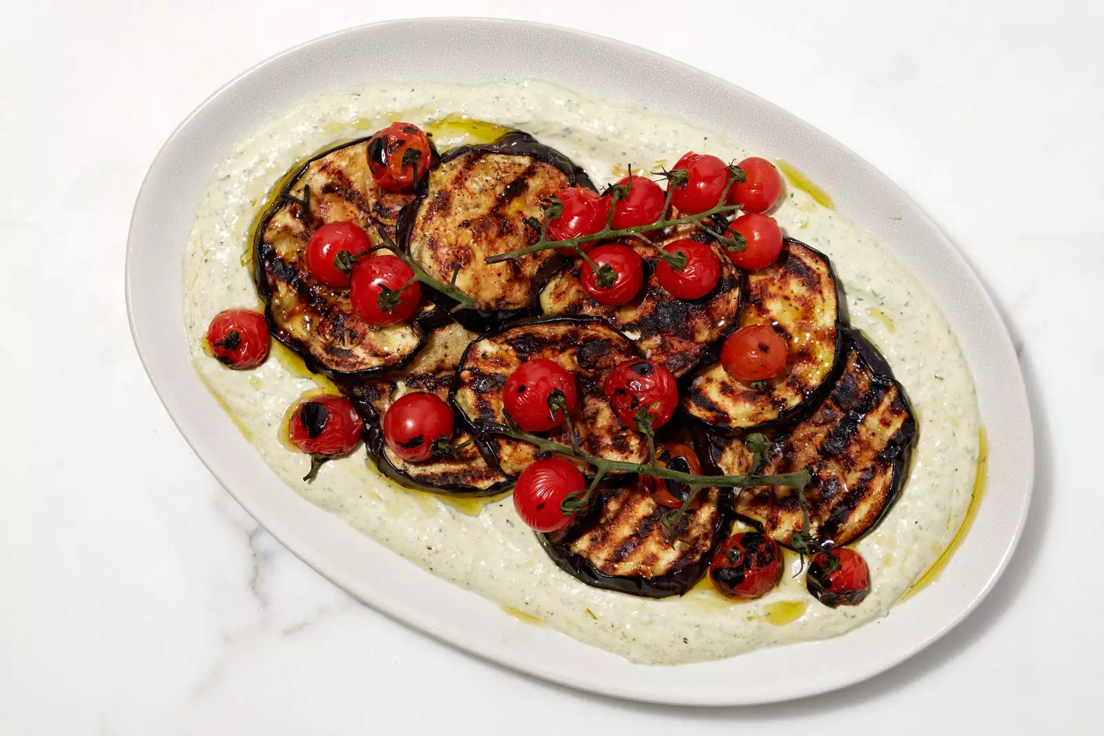 foto nke eggplant grilled na tomato na yogọt na chermoula