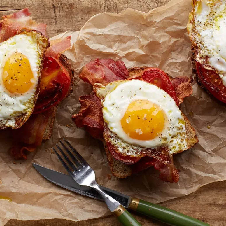 Image may contain Food Egg Burger Pork Cutlery and Fork