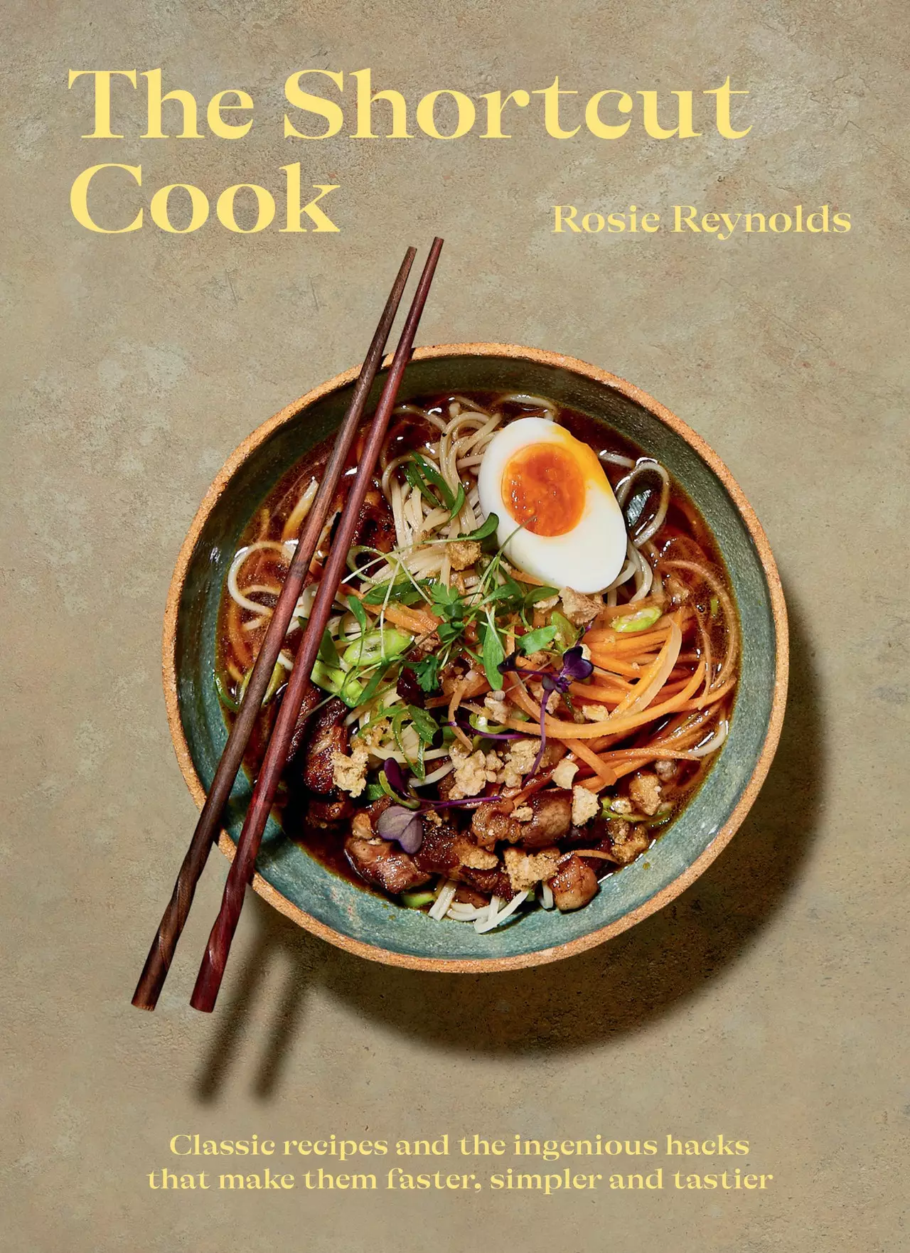 Shortcut Cook Cookbook npog daim duab nrog daim duab ntawm ib lub tais ntawm noodle kua zaub nrog chopsticks.